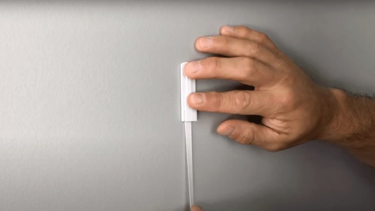 How to Remove Command Strips Without Damaging Your Walls - HelpWithDIY