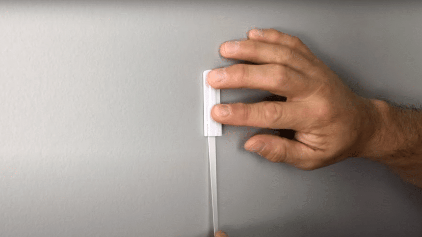 How to Remove Command Strips Without Damaging Your Walls - HelpWithDIY